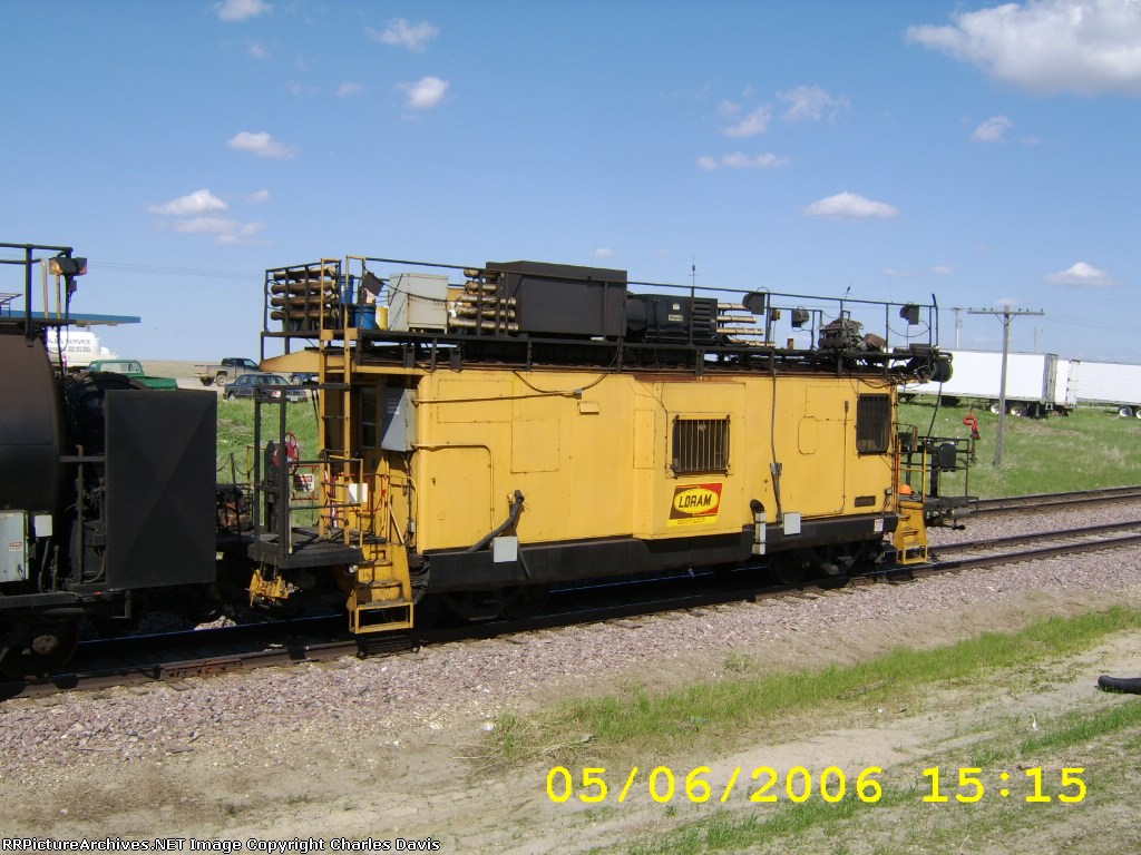 Caboose on Loram RG319 at Bristol SD